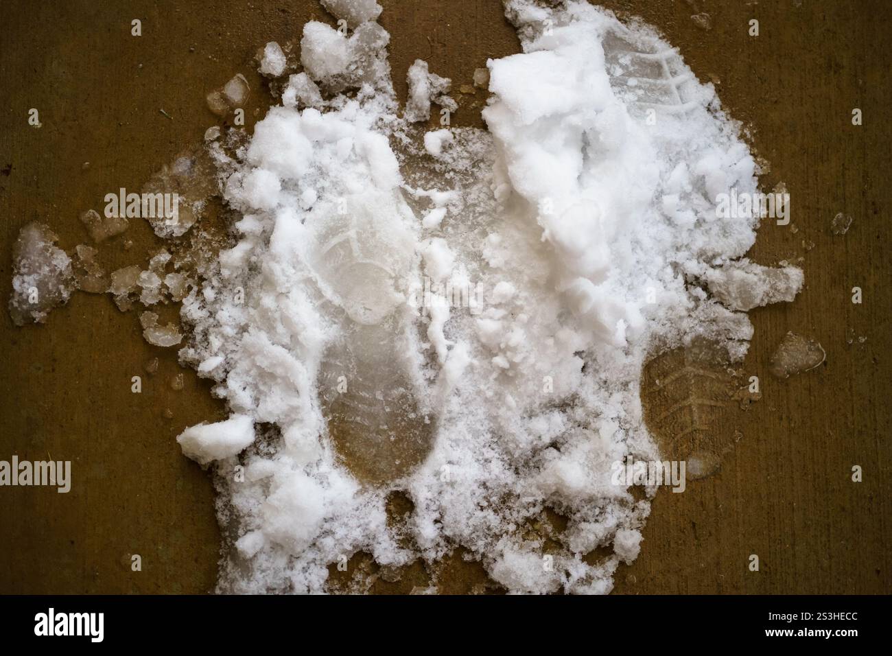 Small Footsteps in the Snow Stock Photo - Alamy