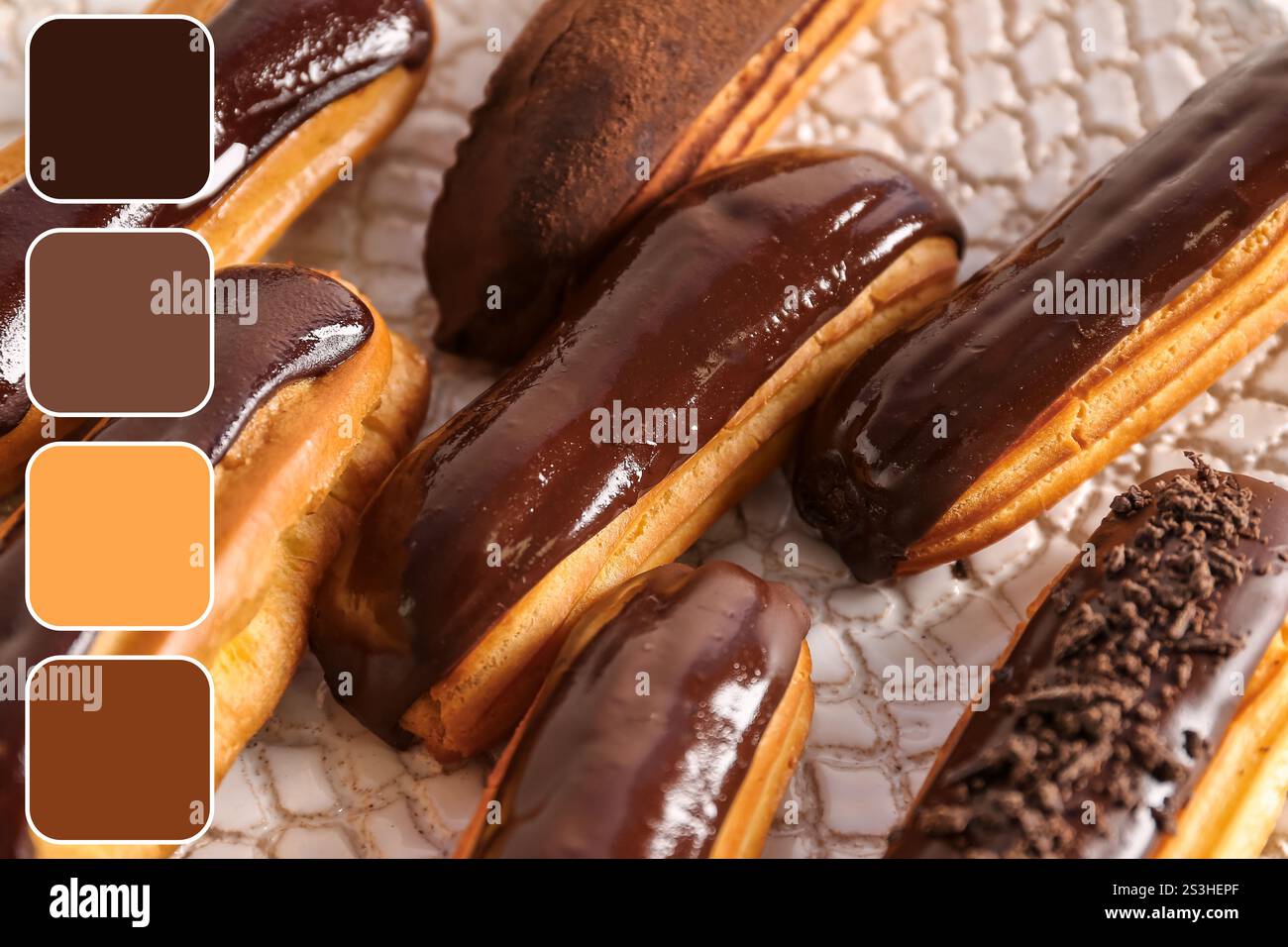 Sweet chocolate eclairs, closeup. Different color patterns Stock Photo ...