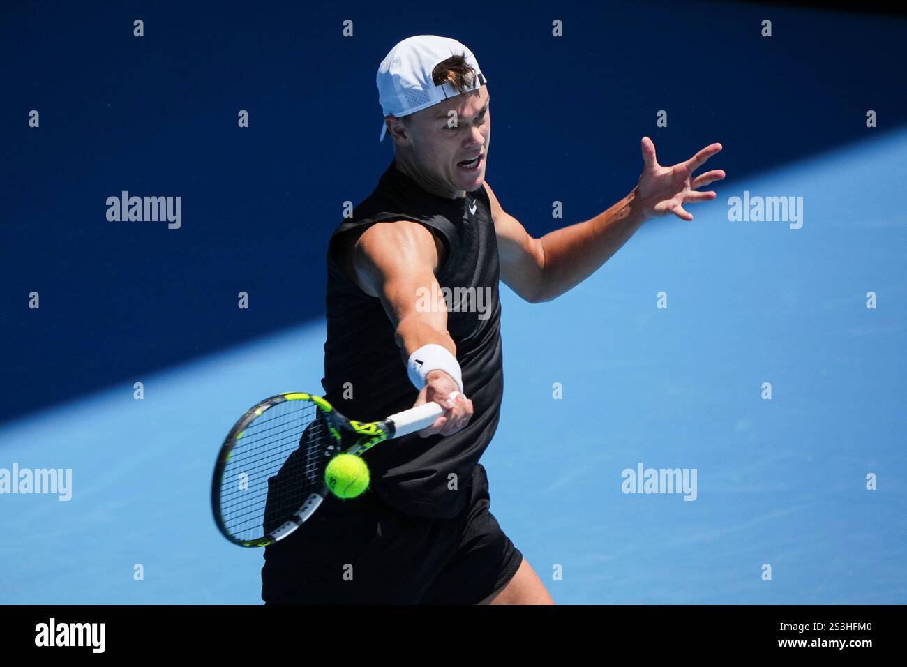 Holger Rune of Denmark plays a forehand return during a practice session ahead of the Australian ...