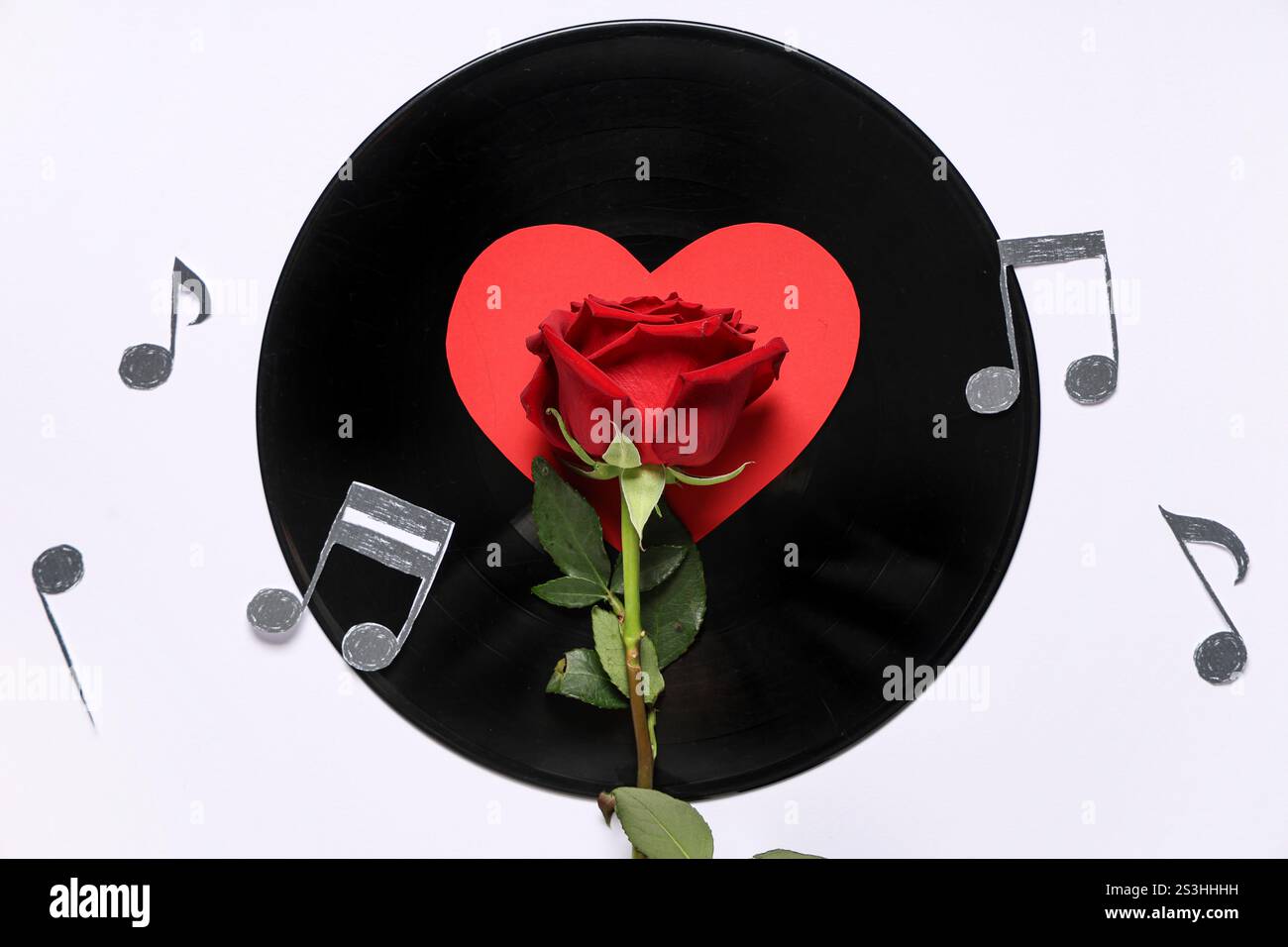 Vinyl disk with rose and notes on white background. Valentine's Day ...