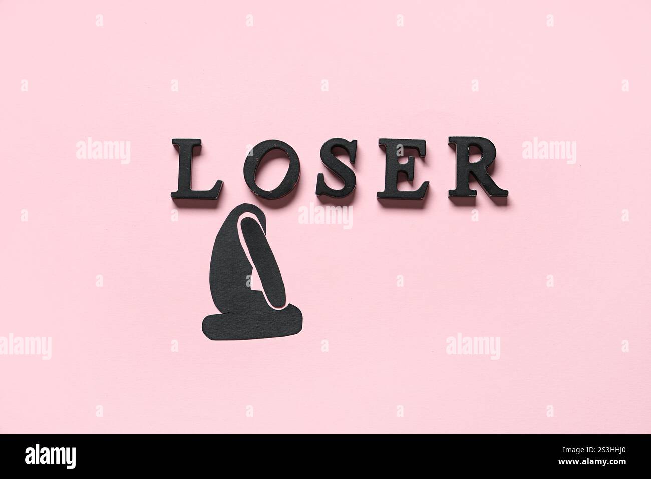 Word LOSER with sad paper human figure on pink background Stock Photo ...