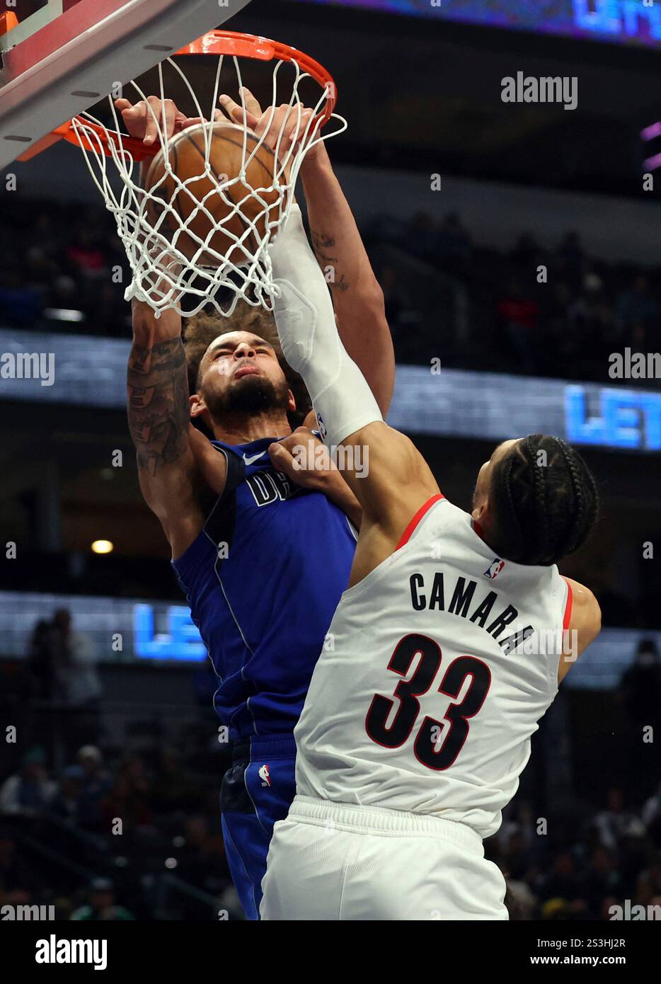 Dallas Mavericks center Dereck Lively II (2) dunks the ball over ...