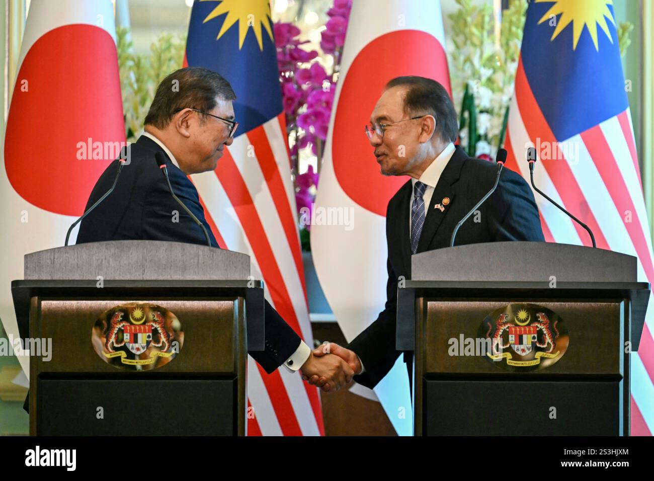 Malaysia's Prime Minister Anwar Ibrahim, right, and Japan's Prime ...