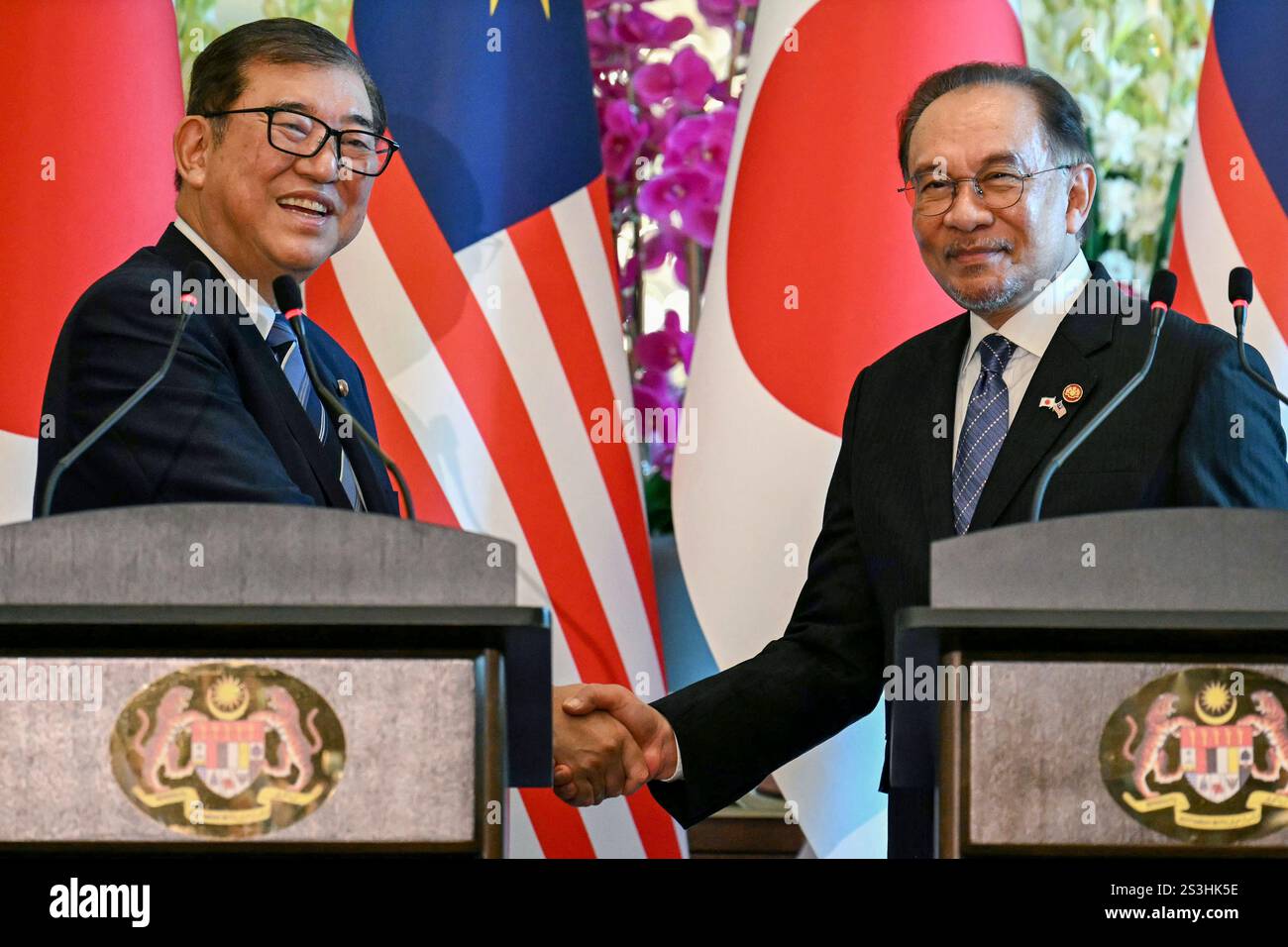 Malaysia's Prime Minister Anwar Ibrahim, right, and Japan's Prime ...