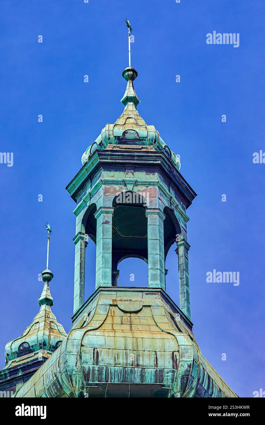 Bell towers and spires and religious cross on the Archcathedral ...