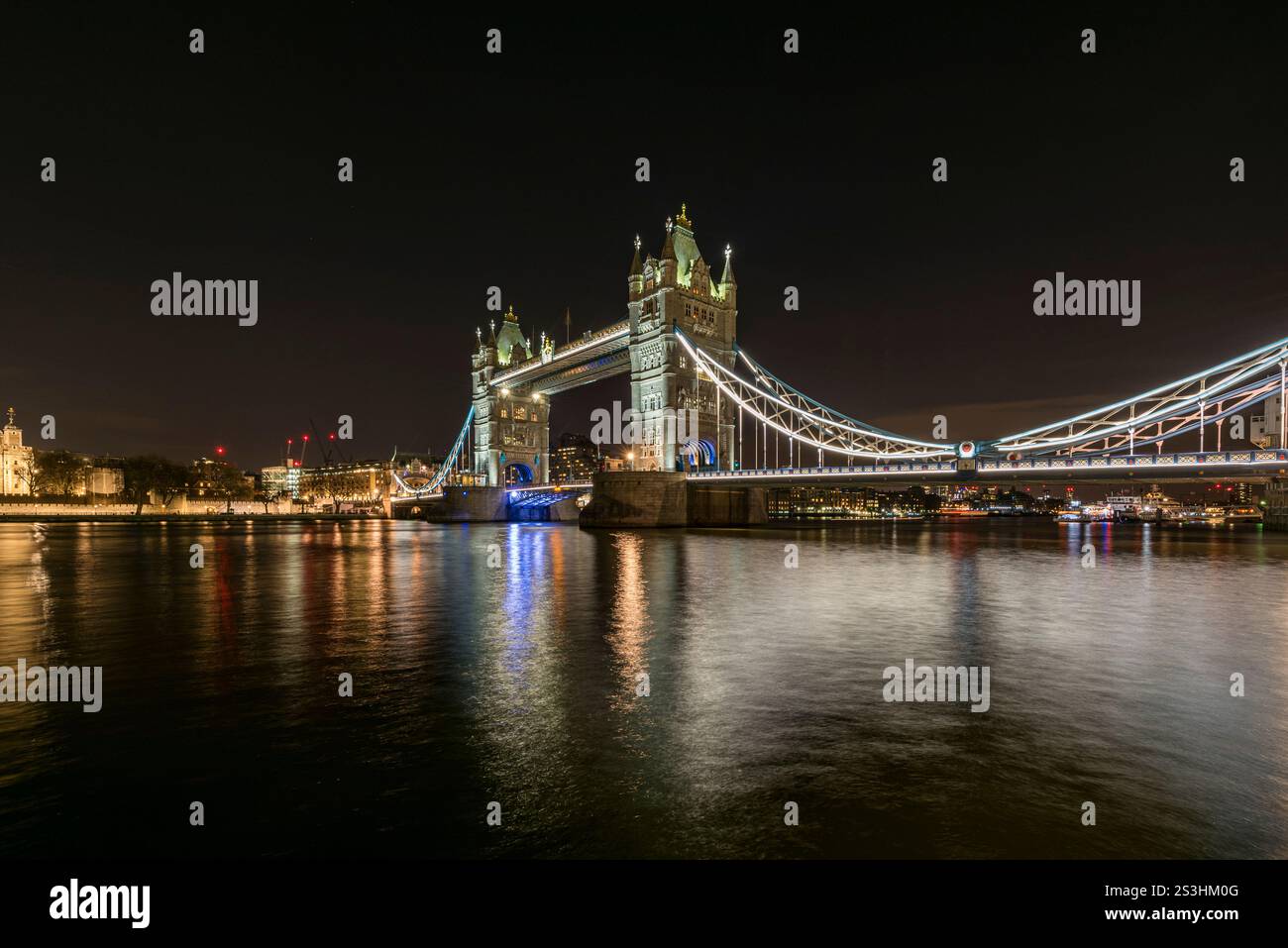 Illuminated Tower Bridge Over River Thames during Night in London Stock ...
