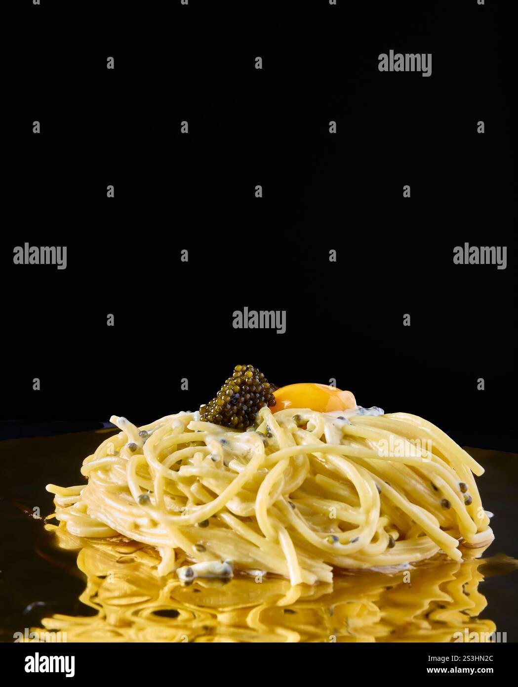 Indulge in luxury with this decadent pasta, topped with delicate caviar ...