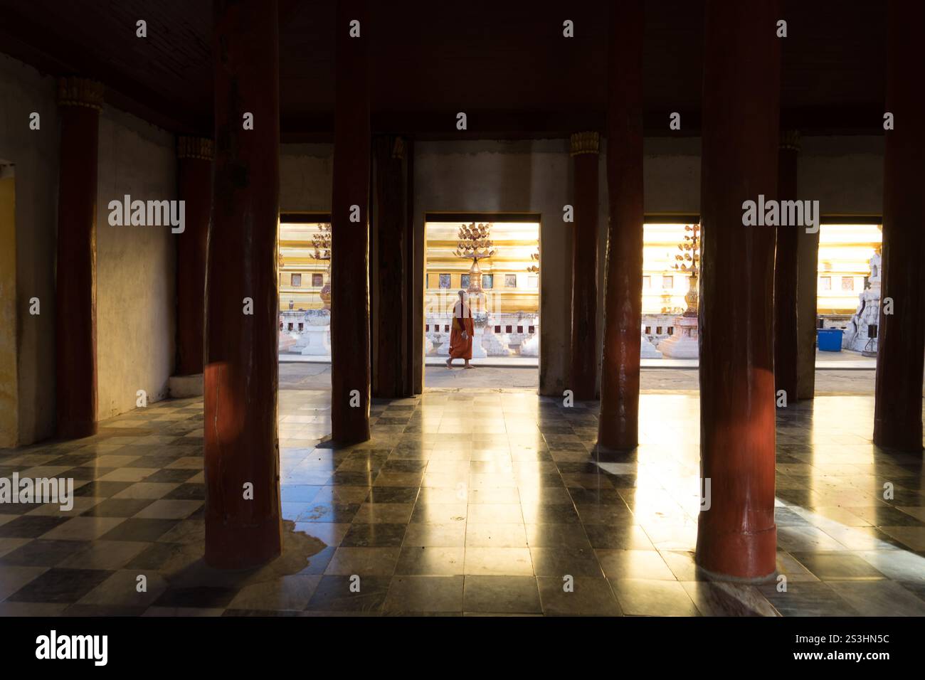 Buddhist Monk Walking Inside a Temple in Myanmar at Sunrise Stock Photo ...