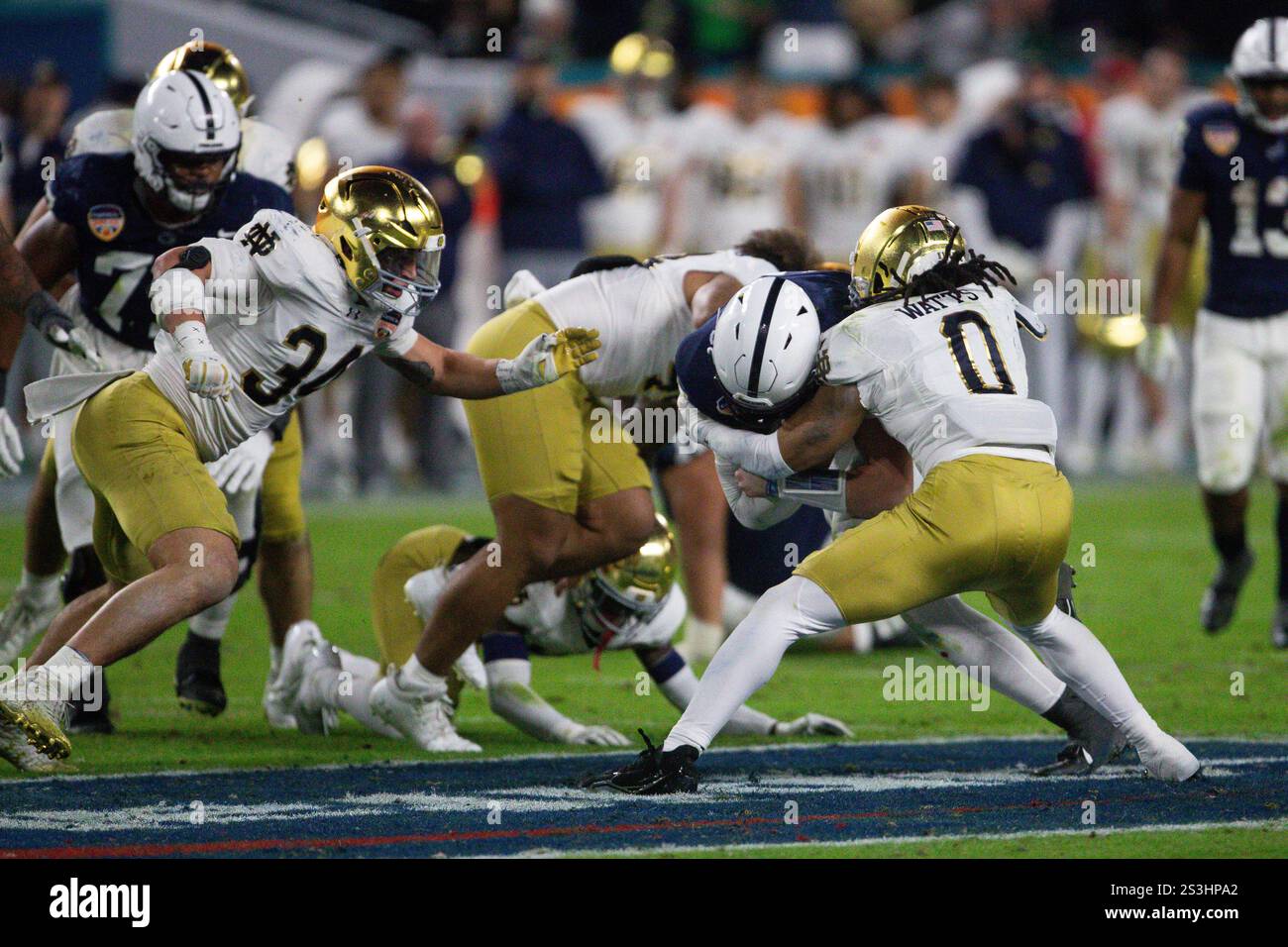 Notre Dame quarterback Anthony Rezac (15) runs the ball and is blocked ...