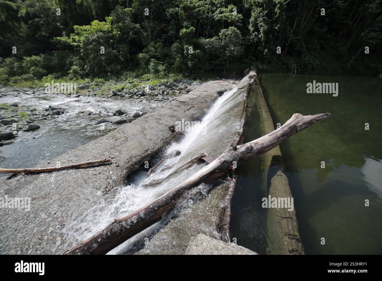 Large water intake at the hydroelectric dam with the backdrop of a ...