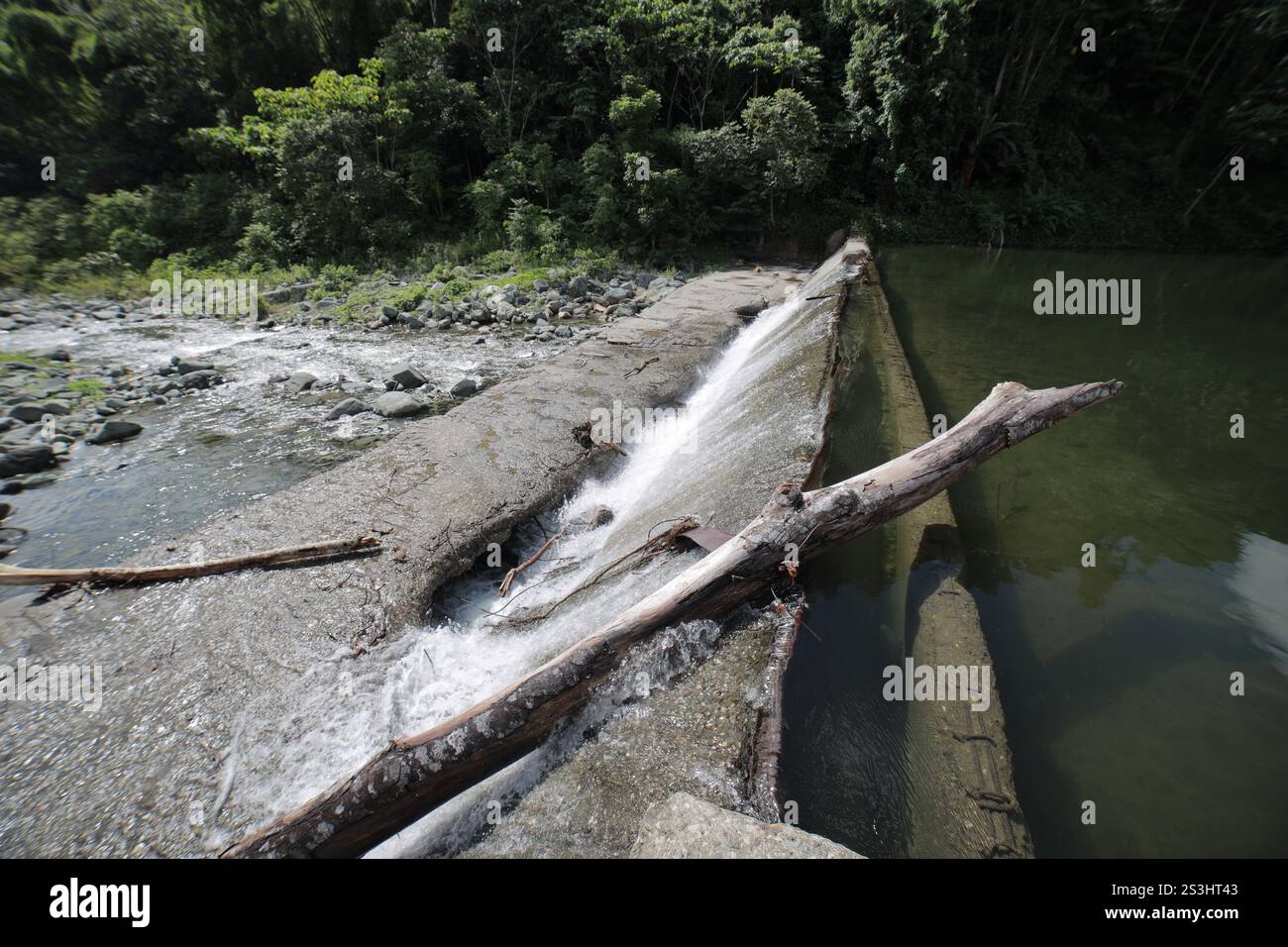 Large water intake at the hydroelectric dam with the backdrop of a ...