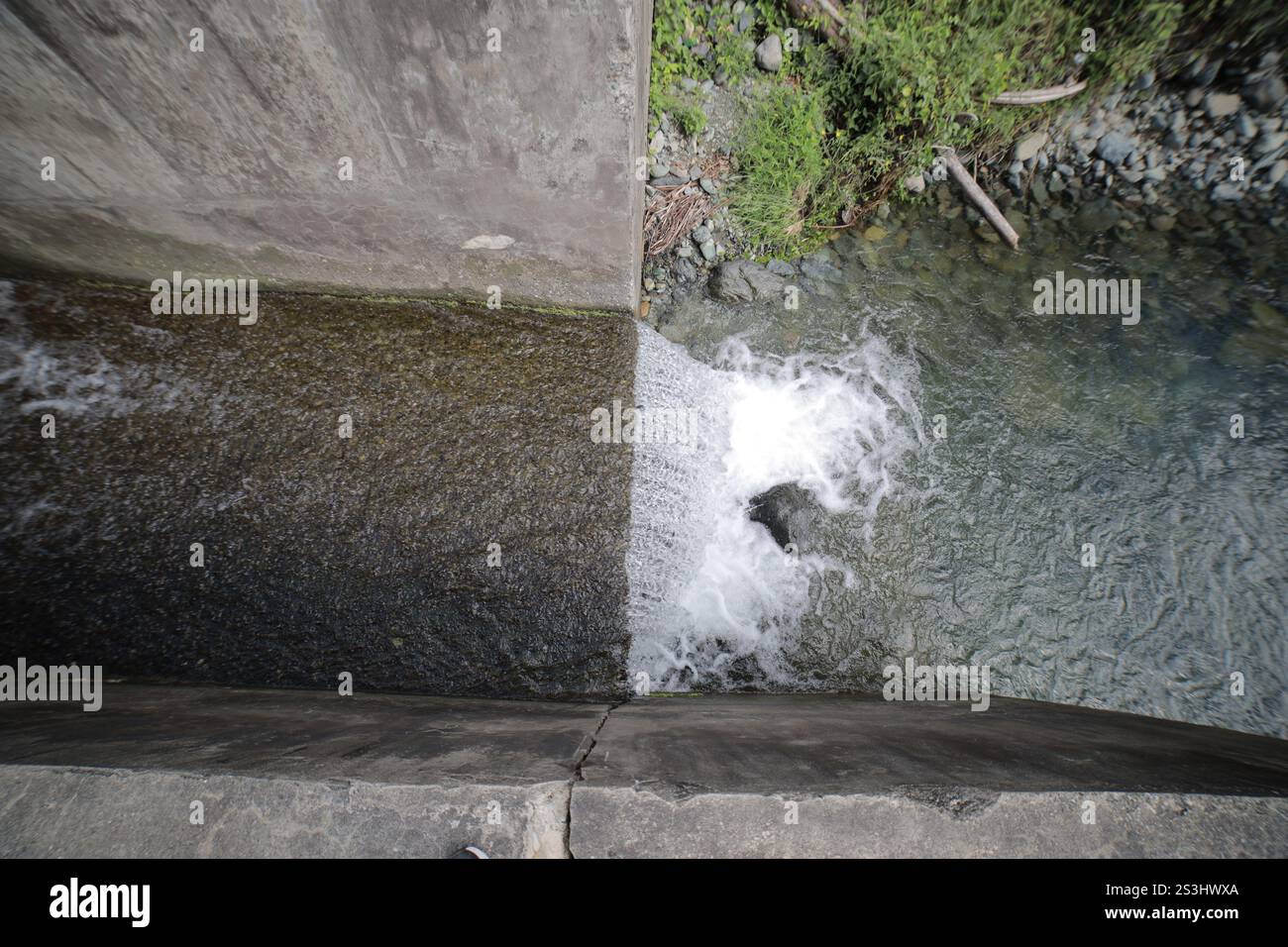 Front water outlet at the hydroelectric dam, beautiful sunny day Stock ...