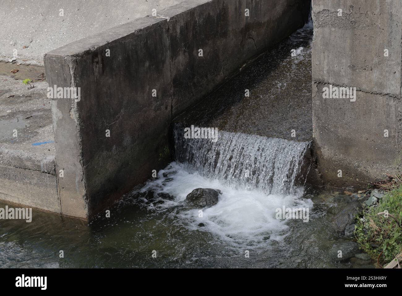 Front water outlet at the hydroelectric dam, beautiful sunny day Stock ...