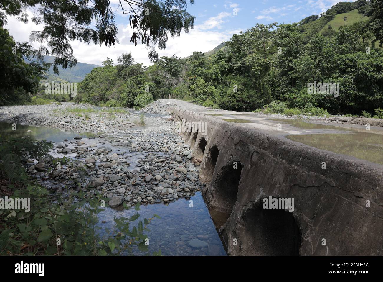 Large water intake at the hydroelectric dam with the backdrop of a ...