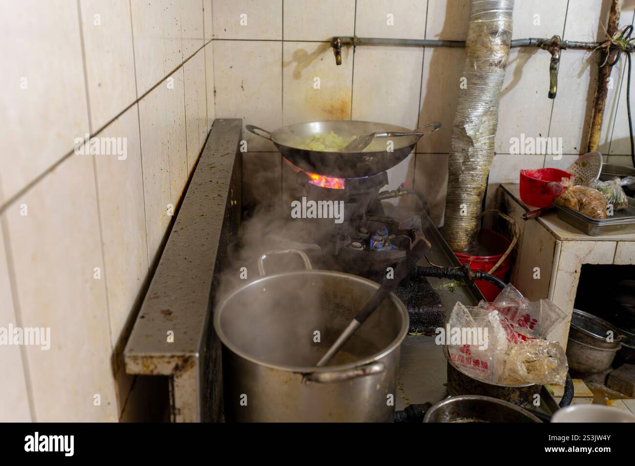 Interior of old street food kitchen in Taiwan's old market Stock Photo ...