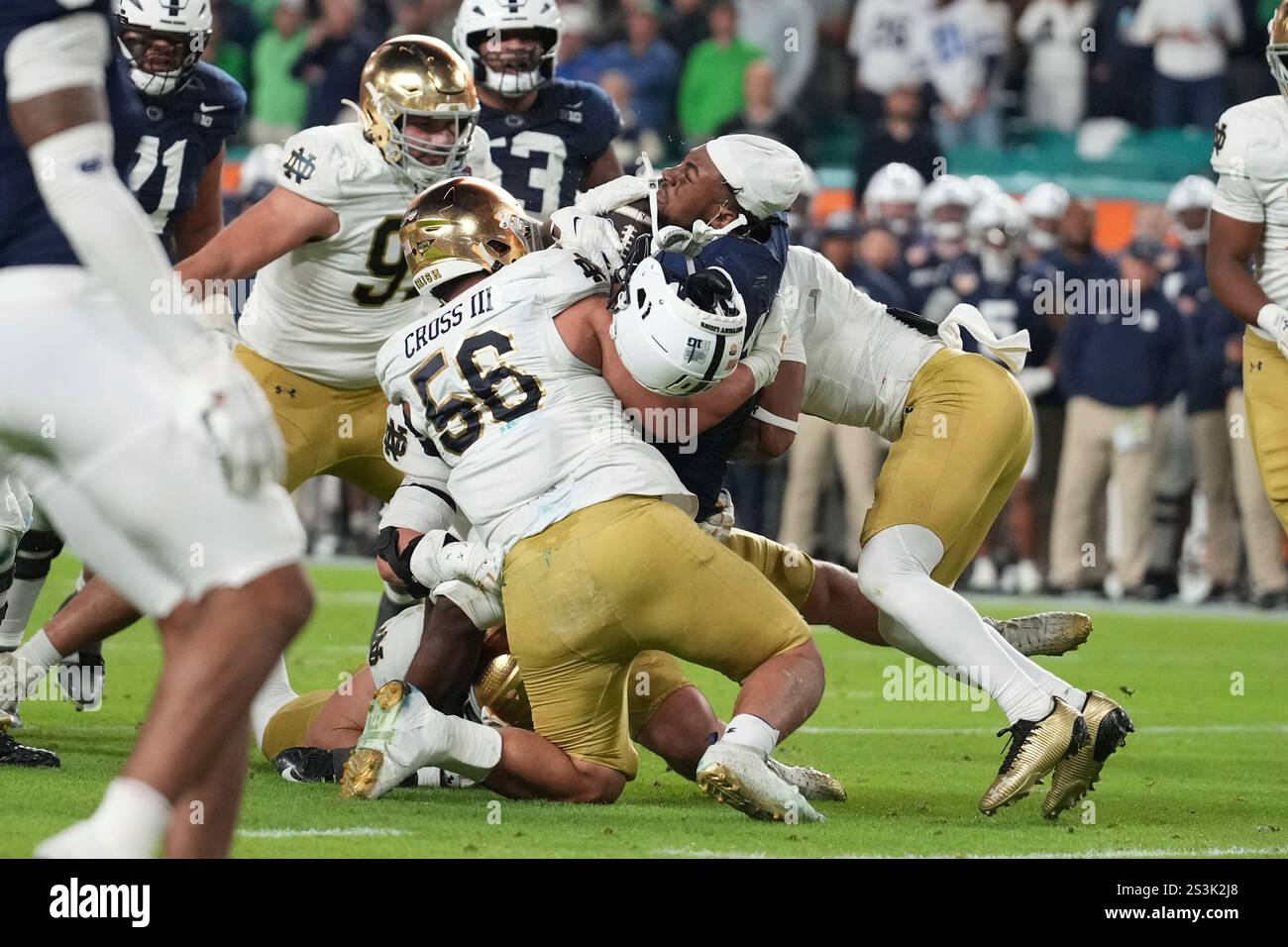 MIAMI GARDENS, FL - JANUARY 09: the helmet pops off of Penn State Nittany Lions running back ...