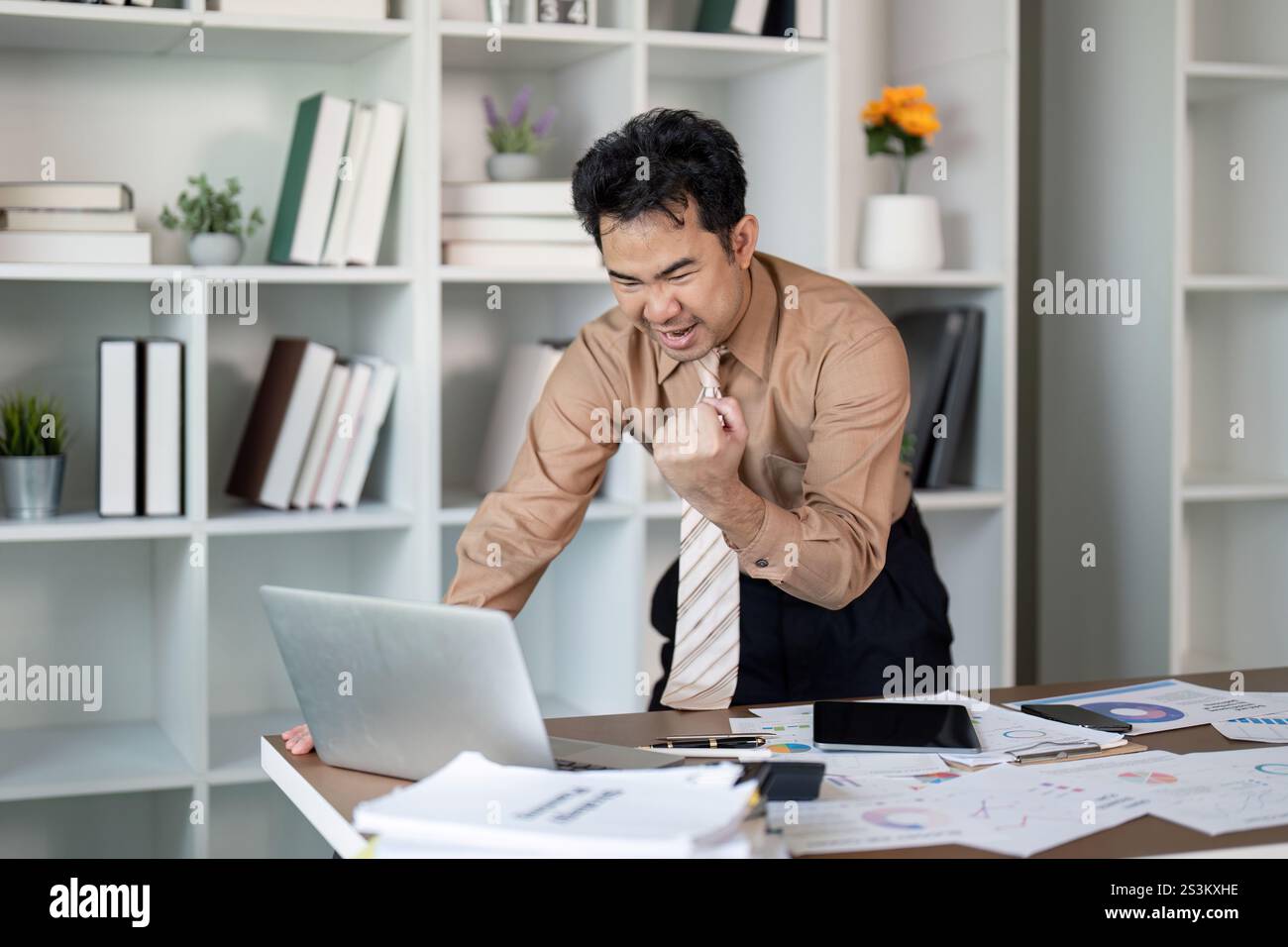 Business success achieved a motivated professional celebrates ...