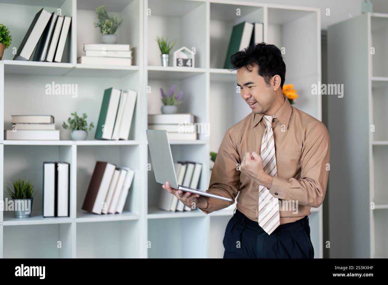 Business success celebration professional in office motivated ...