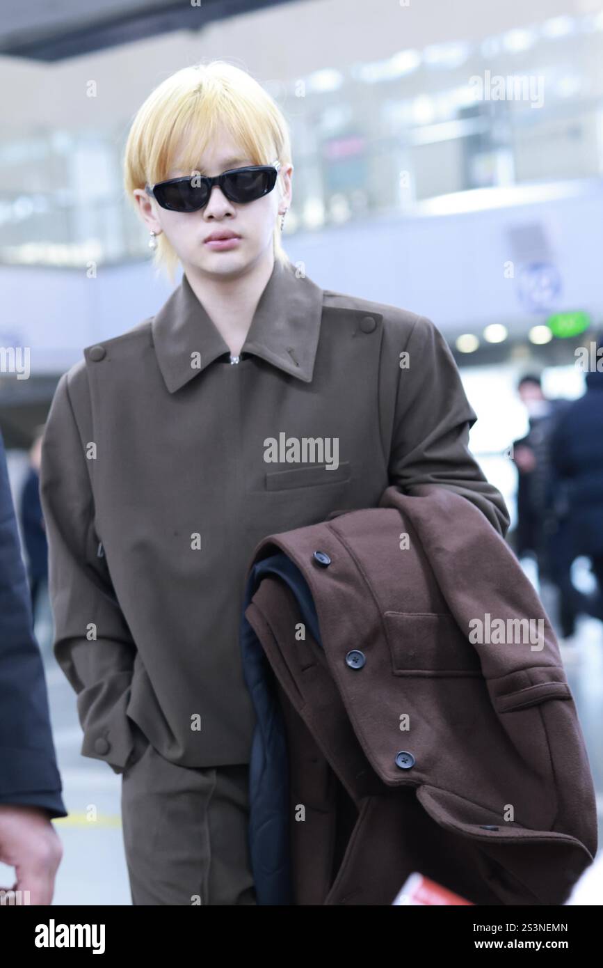 Chinese rapper, singer, songwriter and dancer Zhou Zhennan appears at the airport in Beijing ...