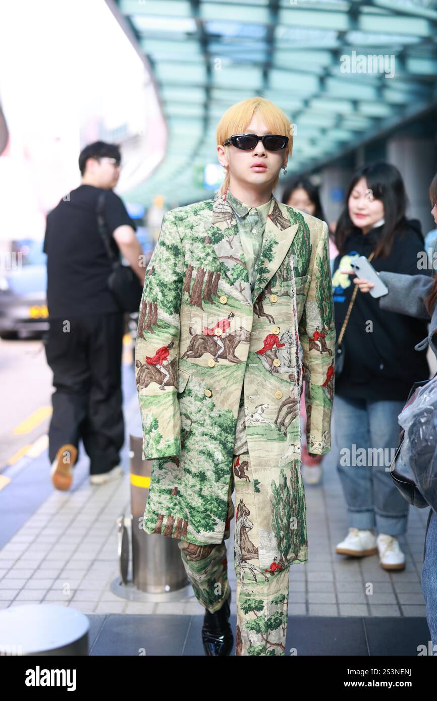 Chinese rapper, singer, songwriter and dancer Zhou Zhennan appears at the airport in Macao ...
