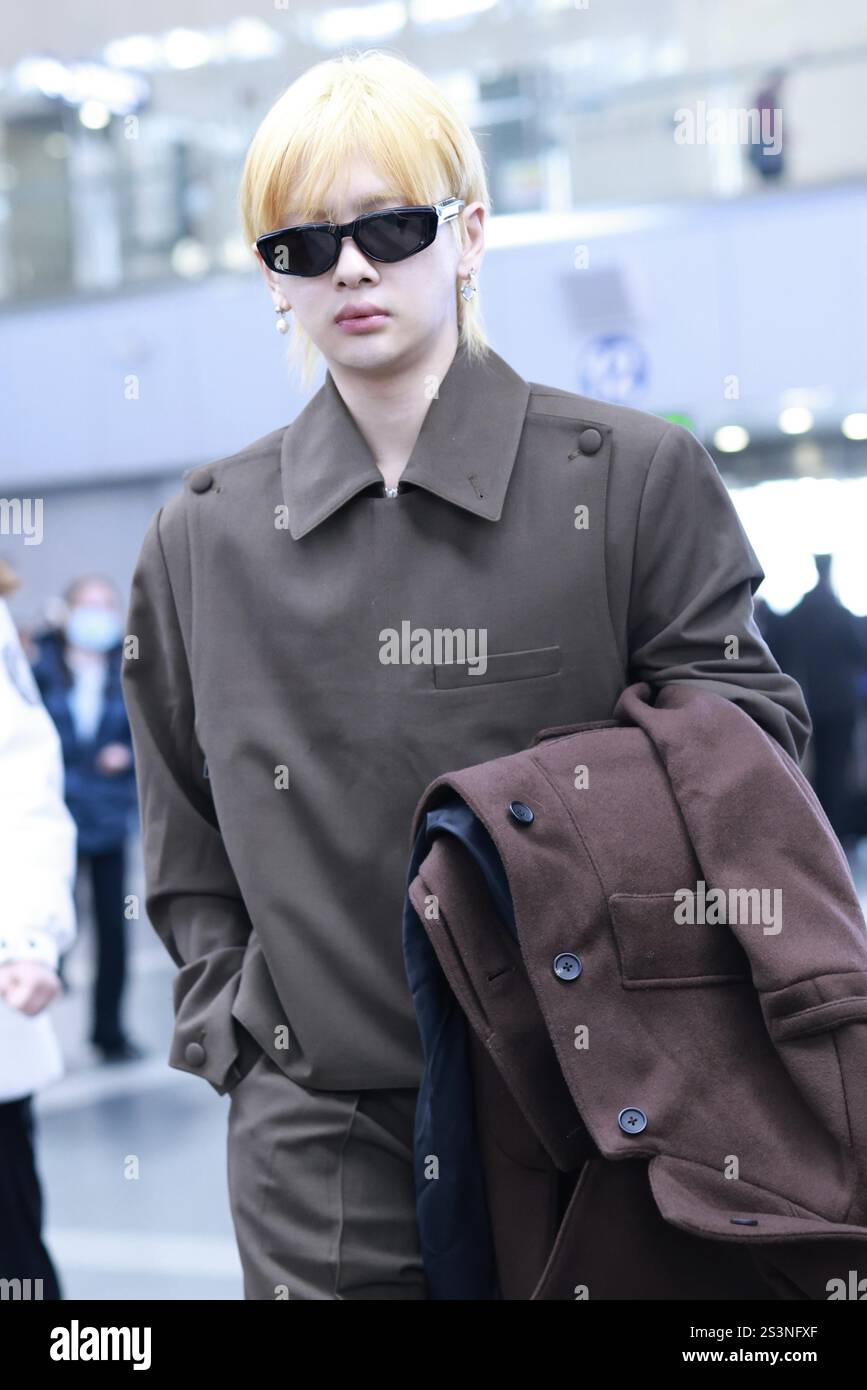 Chinese rapper, singer, songwriter and dancer Zhou Zhennan appears at the airport in Beijing ...