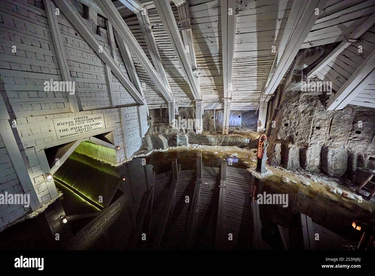 Wooden structures with man made water reserve below ground in the ...