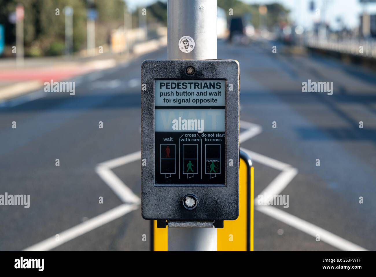 Pedestrian crossing electronic push button panel on a street in England ...