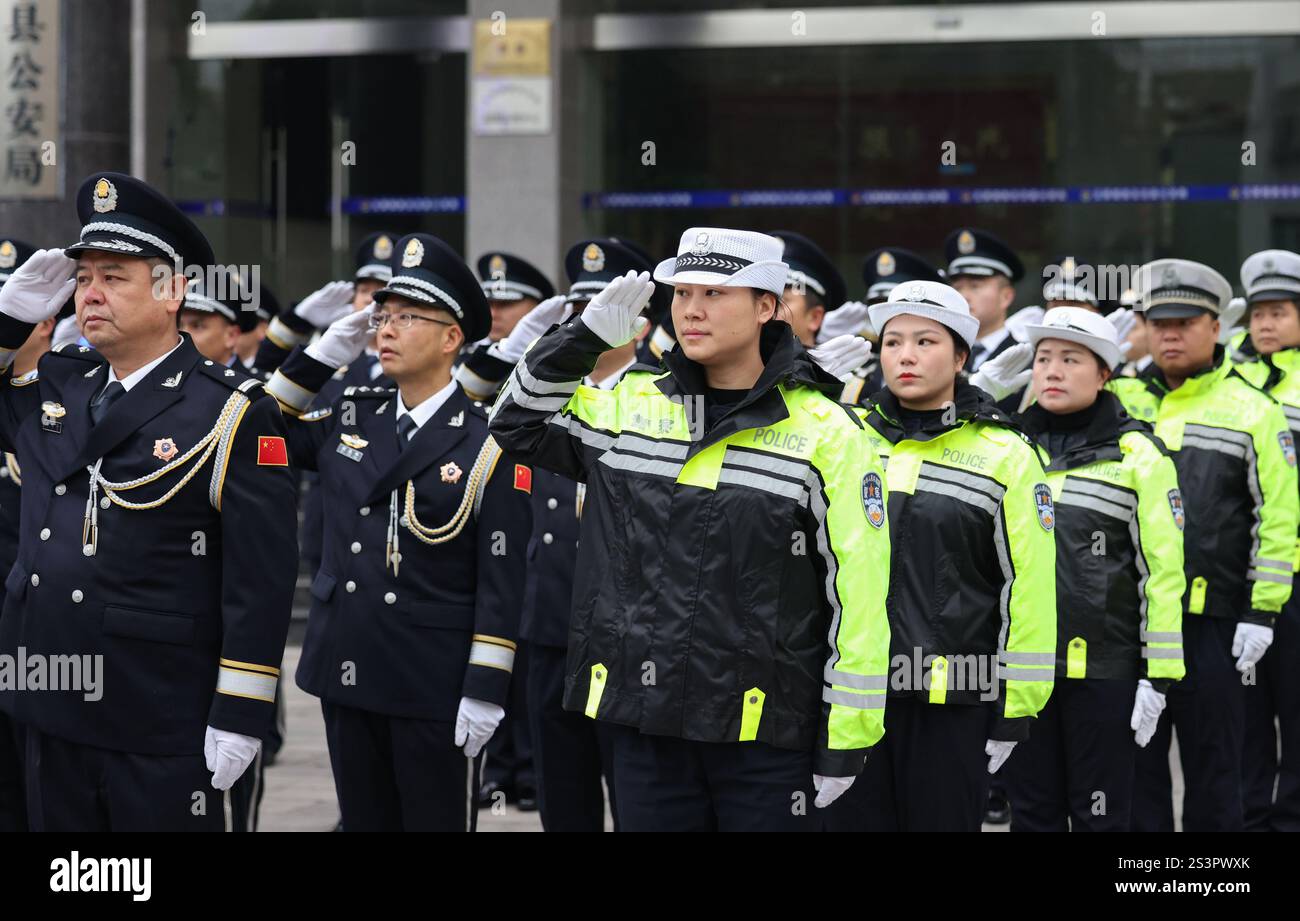 TONGREN, CHINA - JANUARY 10, 2025 - A police flag raising ceremony is ...