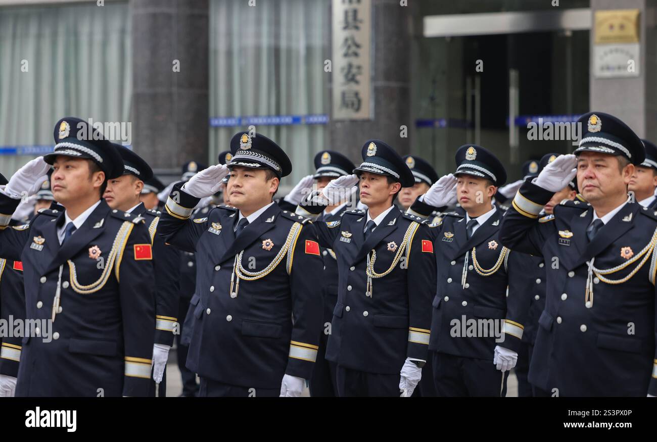 TONGREN, CHINA - JANUARY 10, 2025 - A police flag raising ceremony is ...