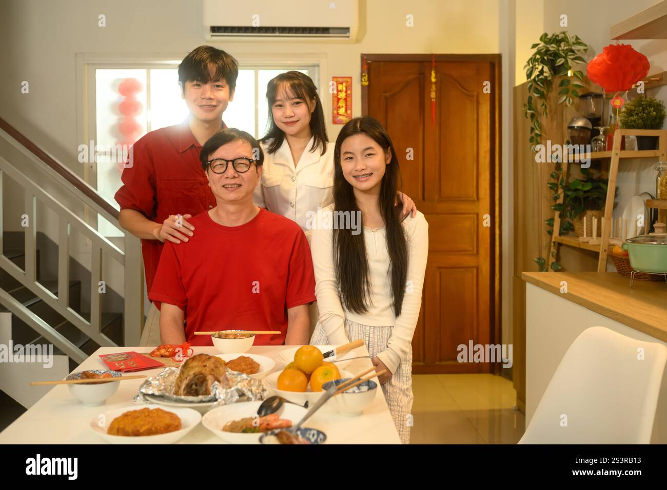 Happy multi generation Chinese family posing for a photo at festive ...