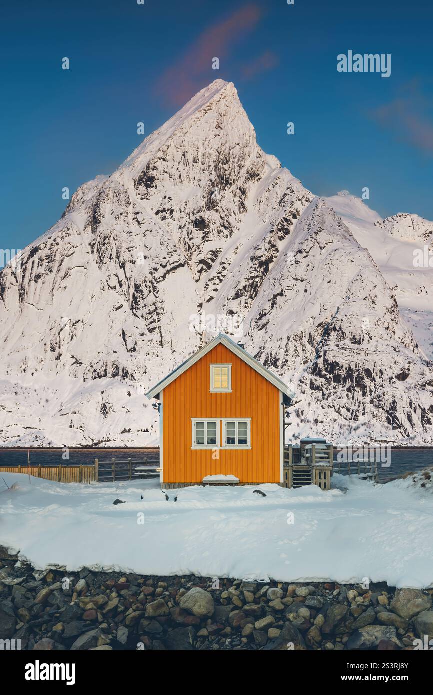 Norwegian yellow beach hut on the sea shore, Lofoten islands, Norway ...