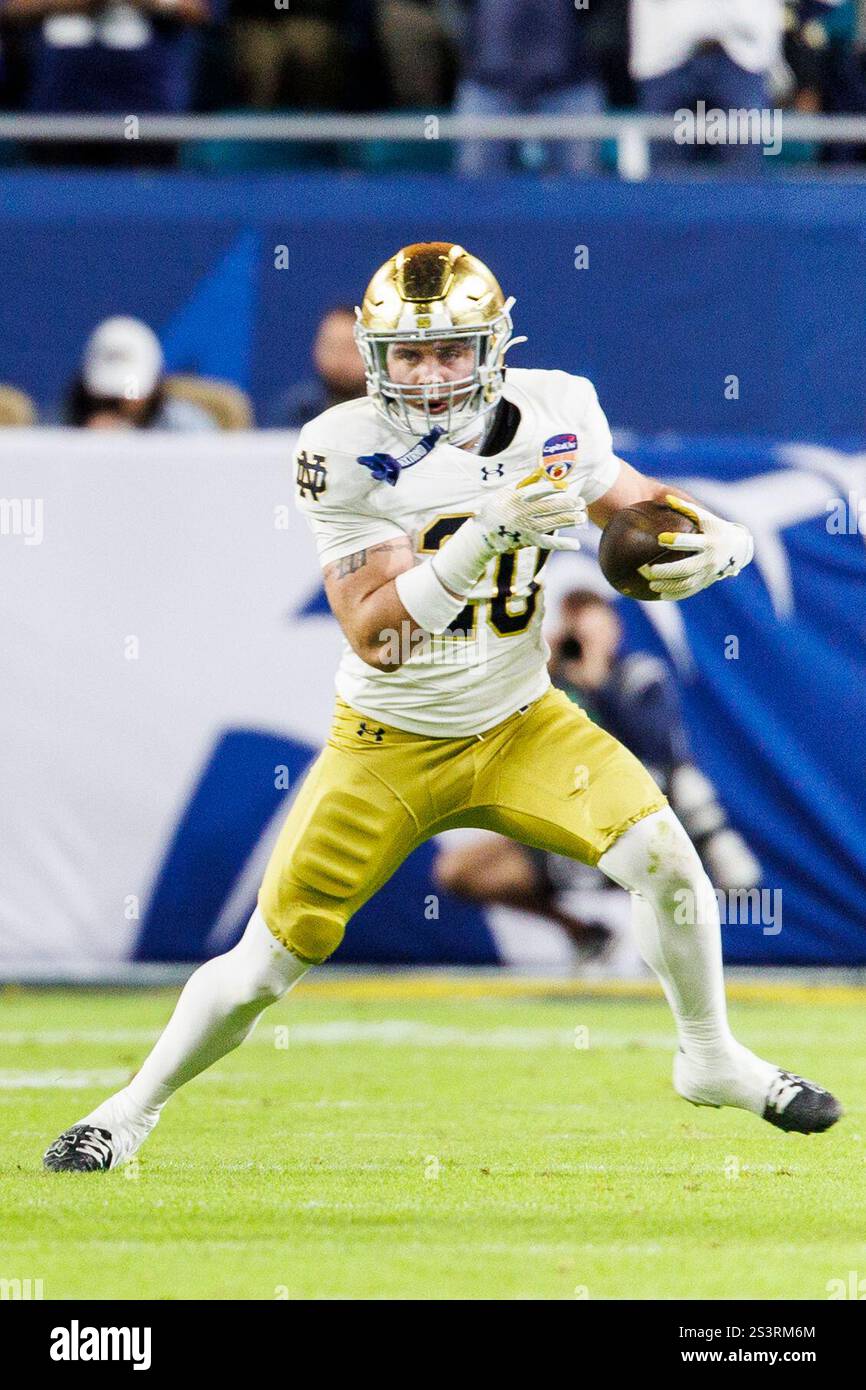 Miami Gardens, Florida, USA. 09th Jan, 2025. Notre Dame running back Aneyas Williams (20) runs ...