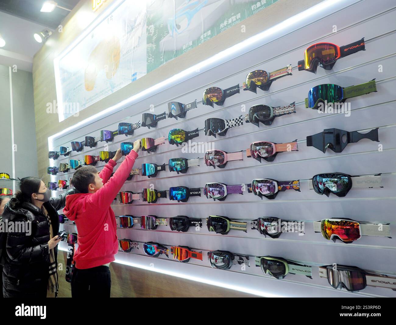 Visitors shop at the 2025 Asia Sportswear and Fashion Show at the China ...