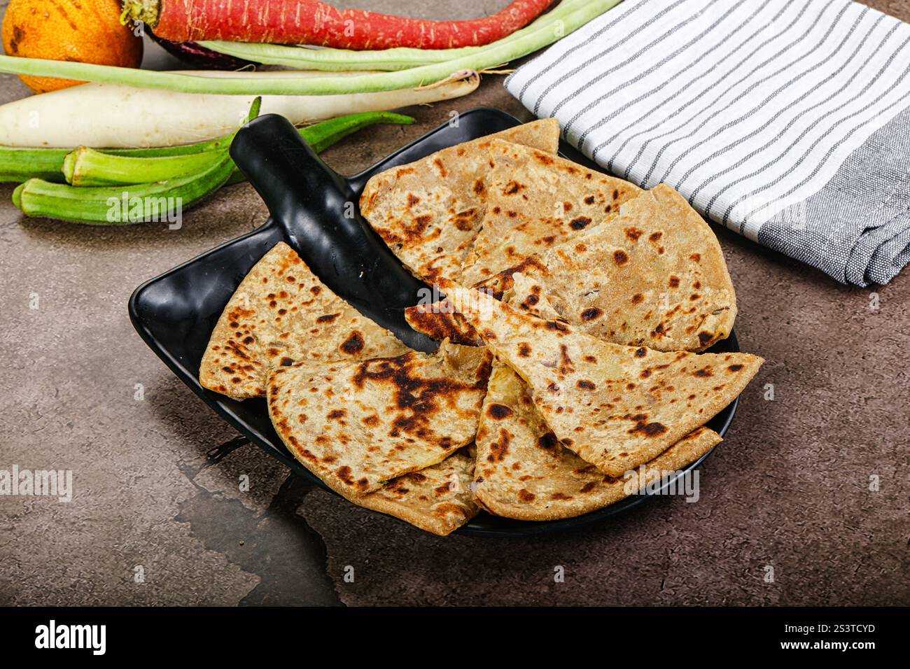 Indian vegetarian Aloo Paratha - bread with potato Stock Photo - Alamy