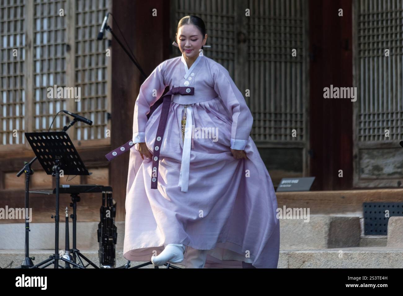 Korean woman dancer wearing traditional Korean clothing hanbok and a ...