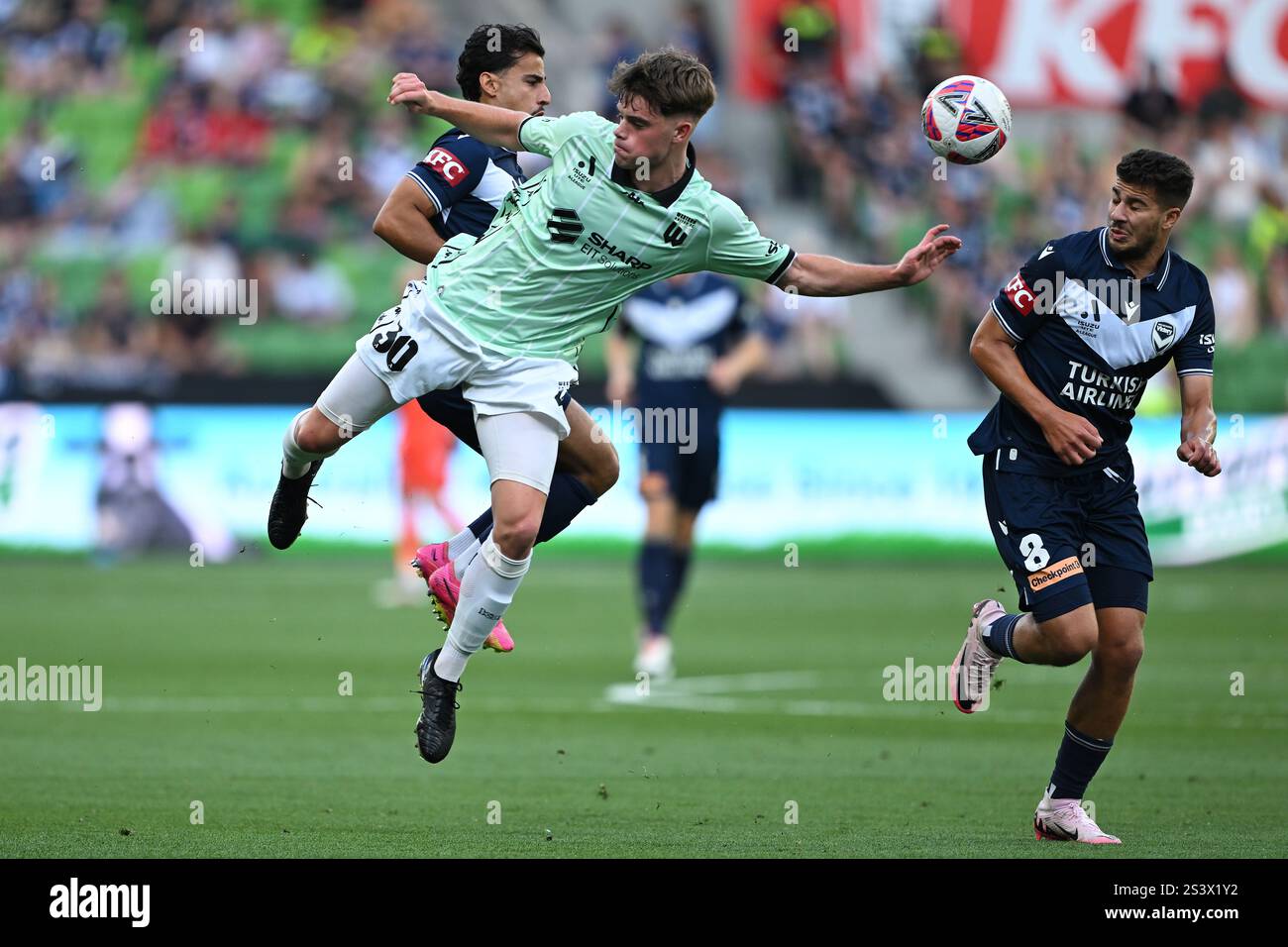 Dylan Leonard of Western United (left) and Zinedine Machach of ...