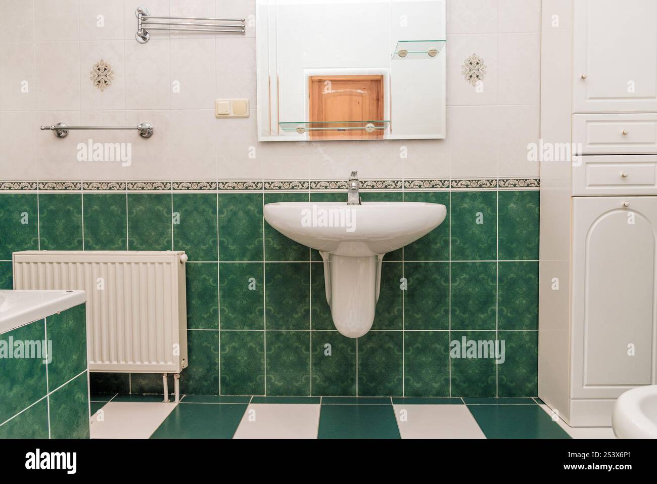 Simple bathroom interior in a residential building, toilet design in a ...