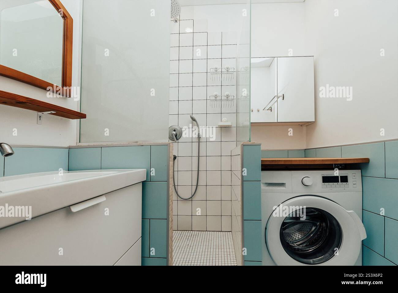 Simple bathroom interior in a residential building, toilet design in a ...