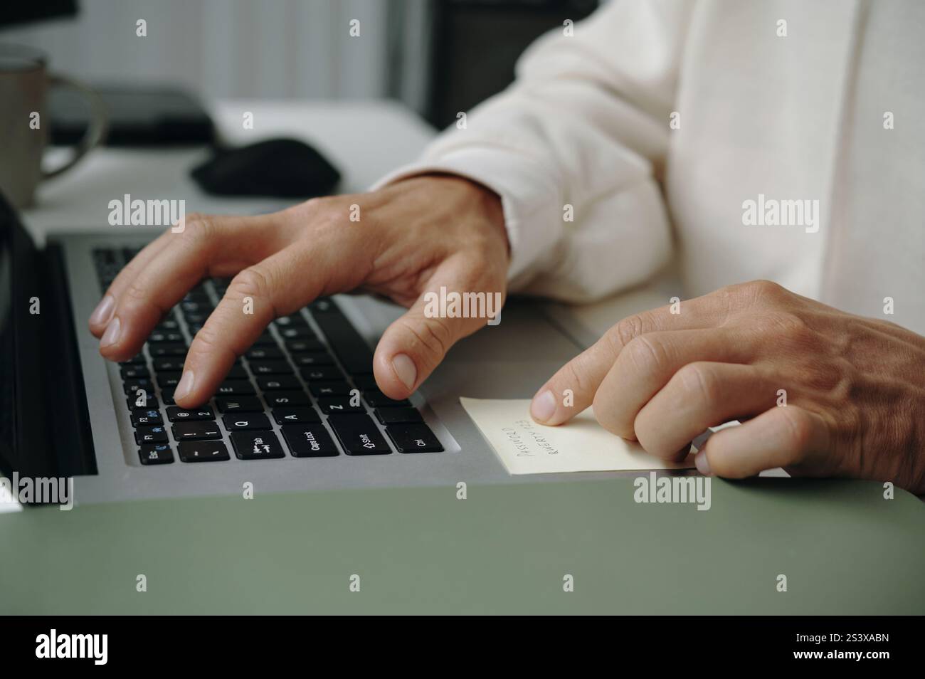 Programmer Typing Password On Laptop Stock Photo - Alamy