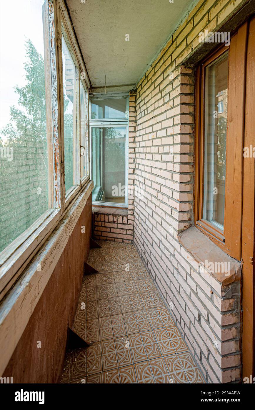 Interior of an old covered balcony of a residential building, loggia ...