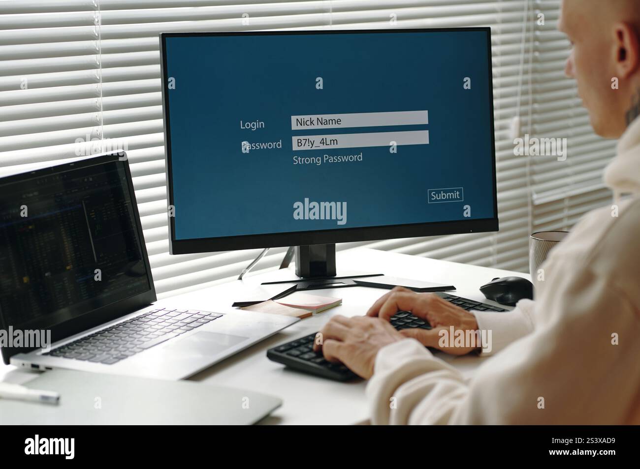 Programmer Entering Password On Computer Stock Photo - Alamy