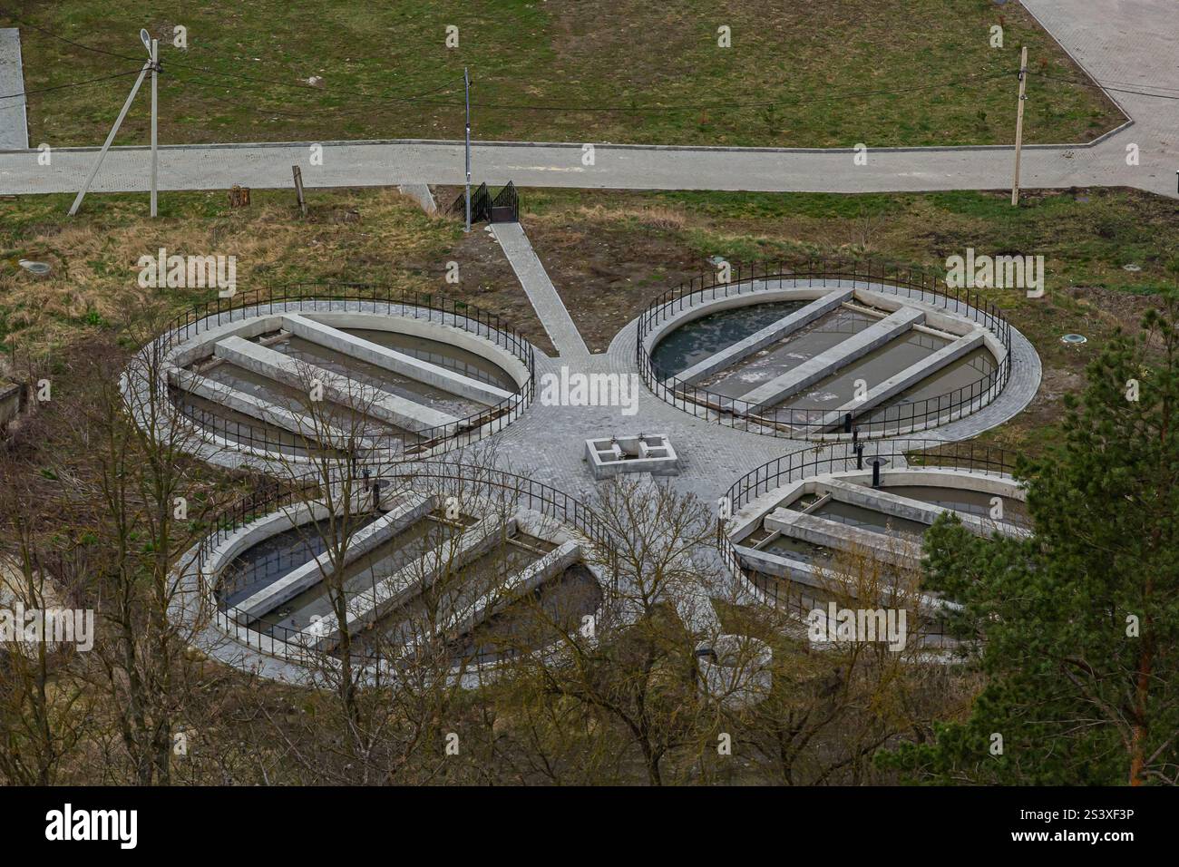 A unique flower-shaped structure is showcased in an urban park ...