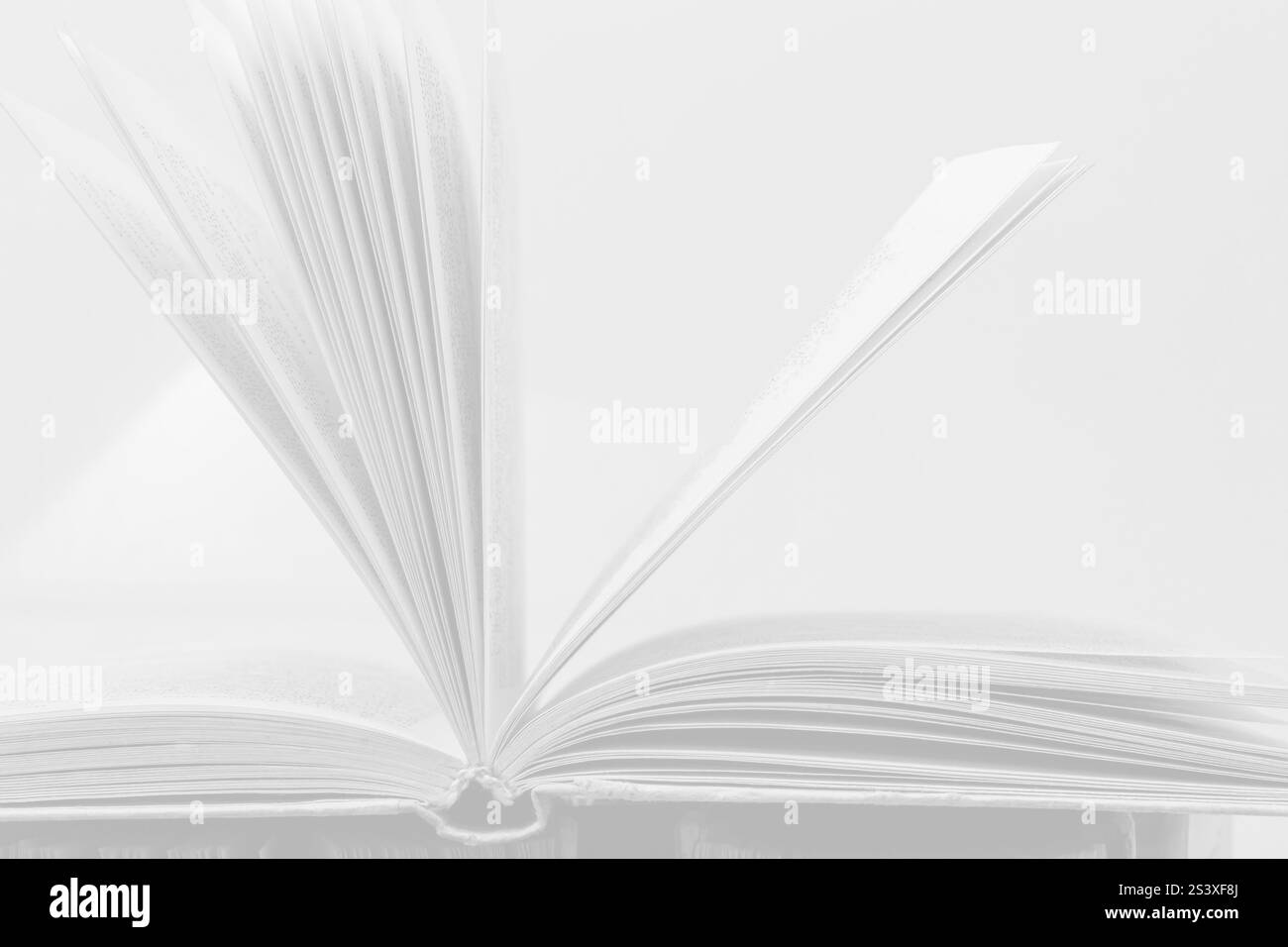 Pages turning on open book Black and White Stock Photos & Images - Alamy