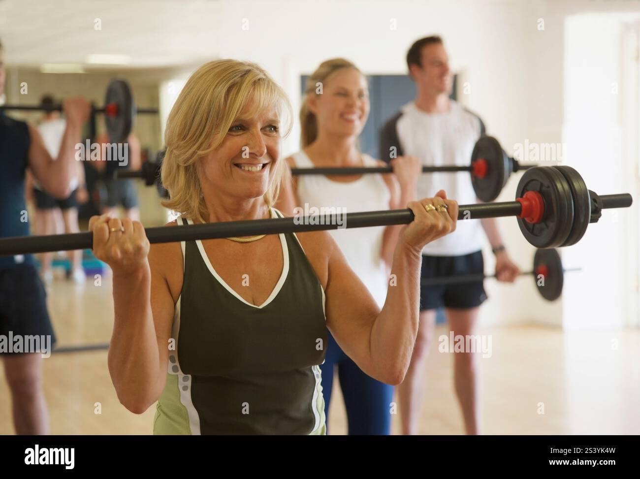 People at a body pump fitness class Stock Photo - Alamy