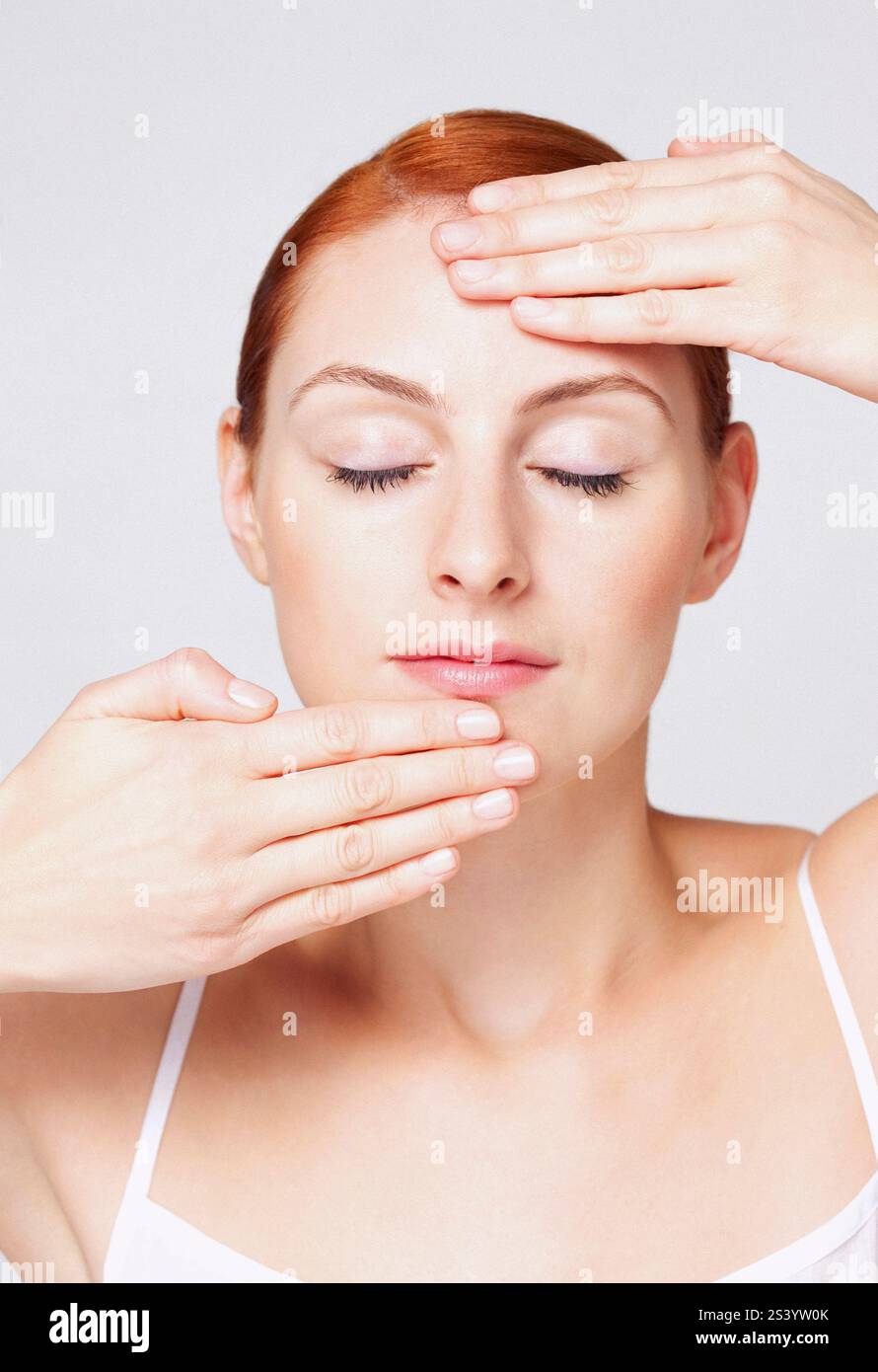 Facial fingers on forehead hi-res stock photography and images - Alamy