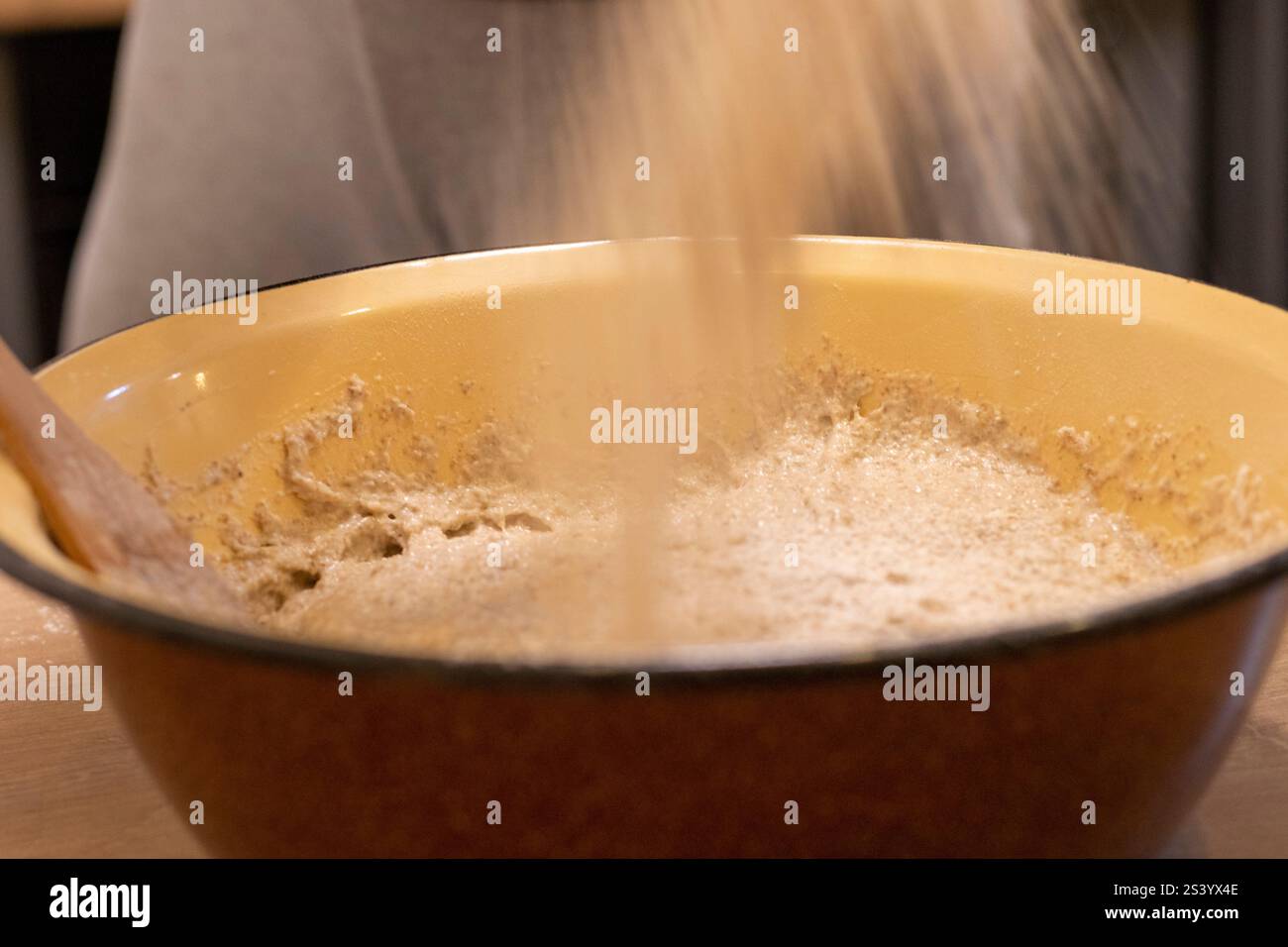 Close up shot of the dough in the bawl on the kitchen counter top Stock ...