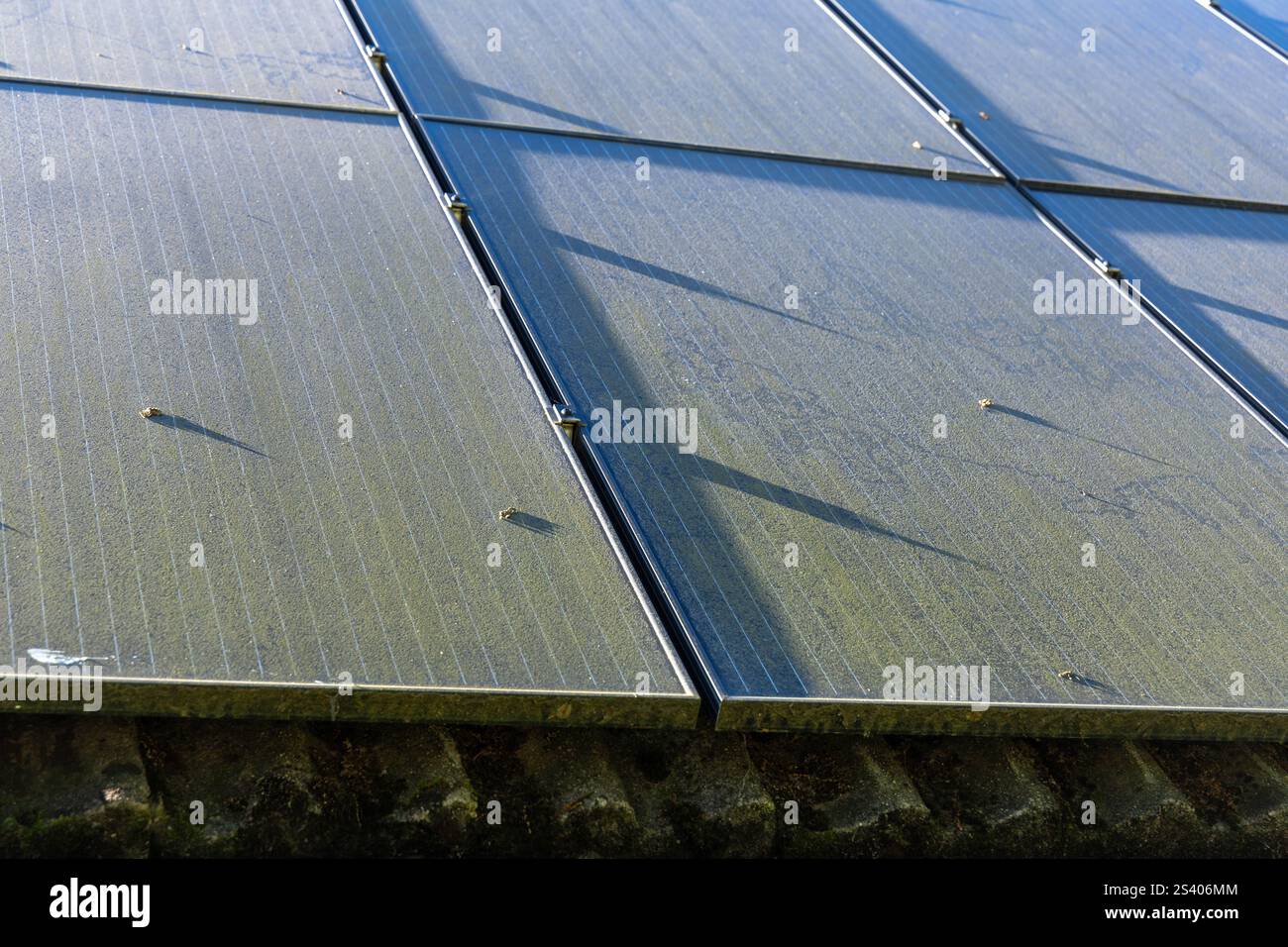 Utrecht, the Netherlands. 19 June 2024. dirty solar panels on the roof ...