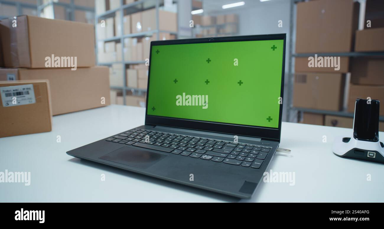 Postal Warehouse Associate Scans Code on Cardboard Box with Barcode Scanner, Checks Parcel ...