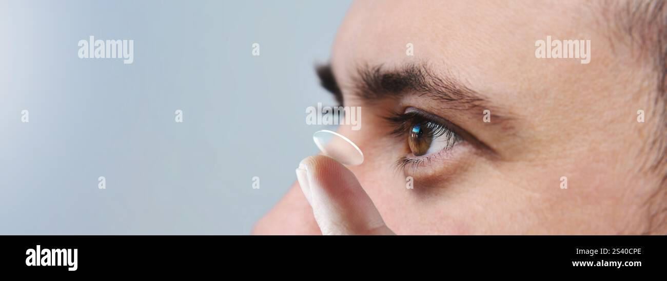 Contact lens insertion in the eye, macro close-up photo, vision ...