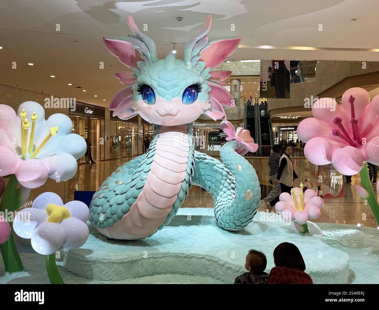 Giant snake decorations are installed in a shopping mall in Nanjing ...
